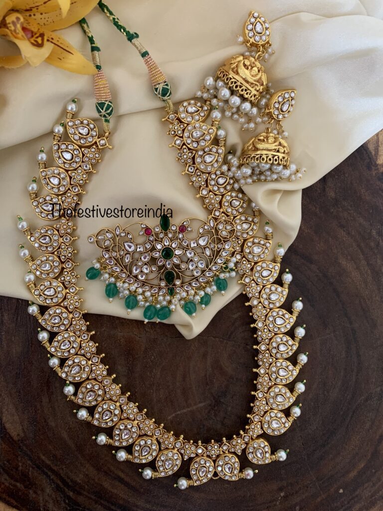 An all white made to order detachable pendant Jadau Mango haara set ...